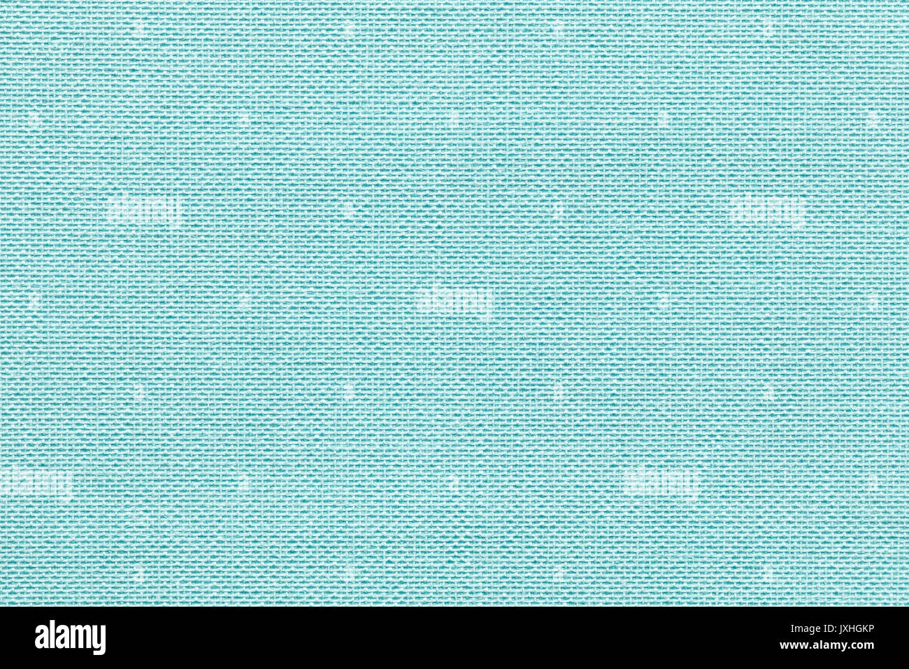 Light blue background from a textile material with wicker pattern ...
