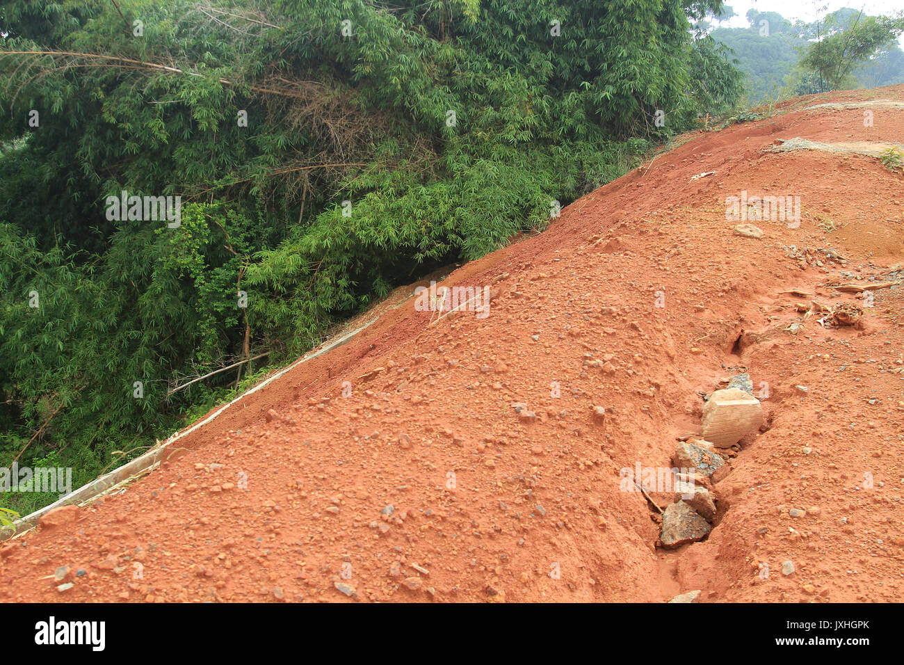 Deep sandy cliff - the destruction of the mountain as a consequence of ...