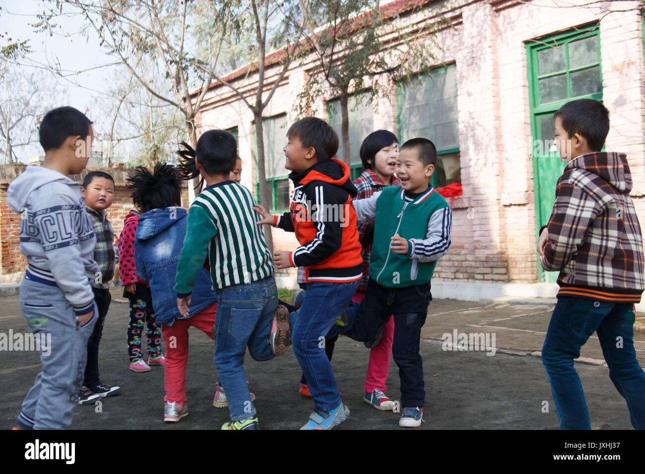 School children play games at school Stock Photo - Alamy