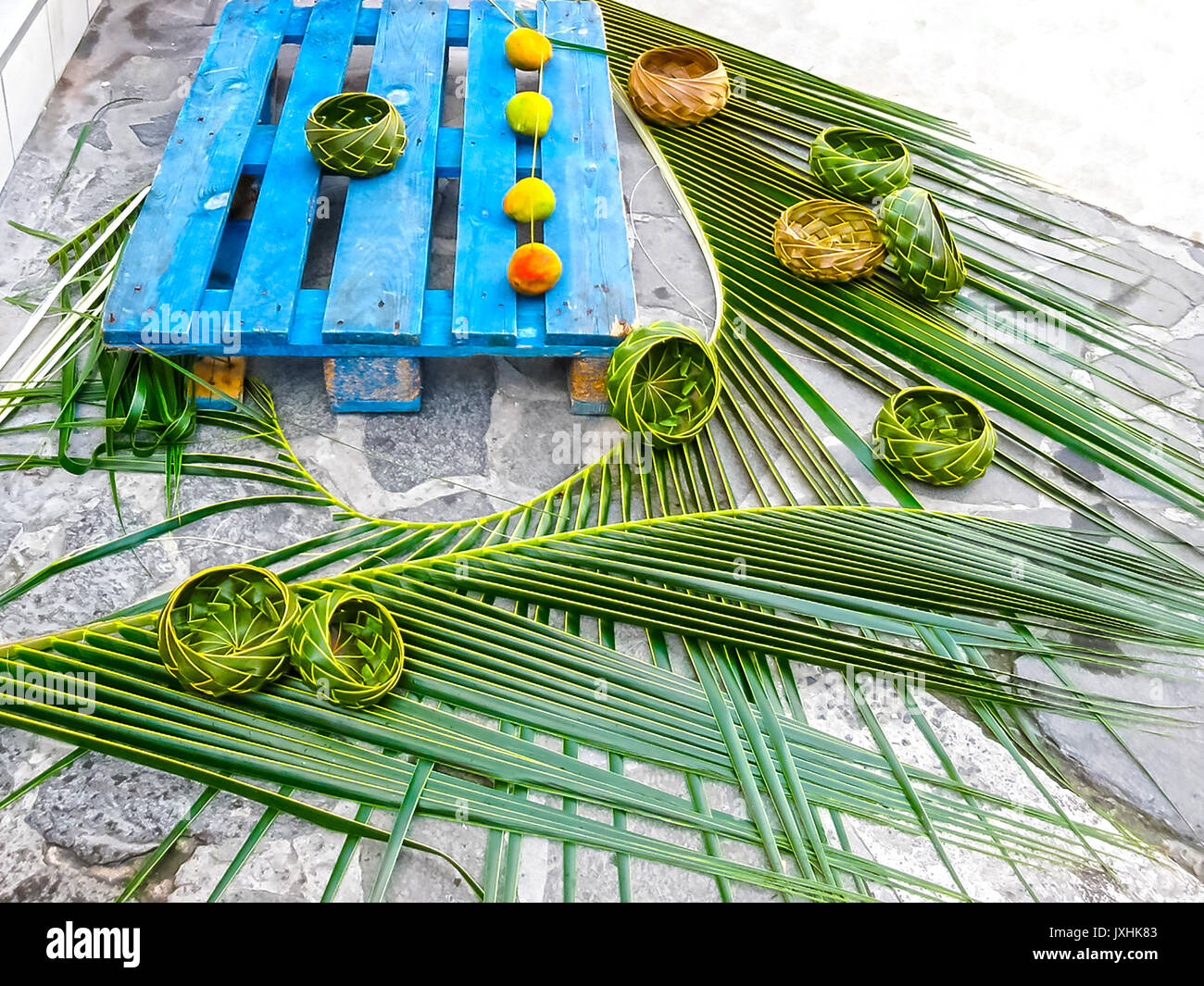 Caribbean souvenirs - wicker vases of palm leaves - handmade work Stock ...