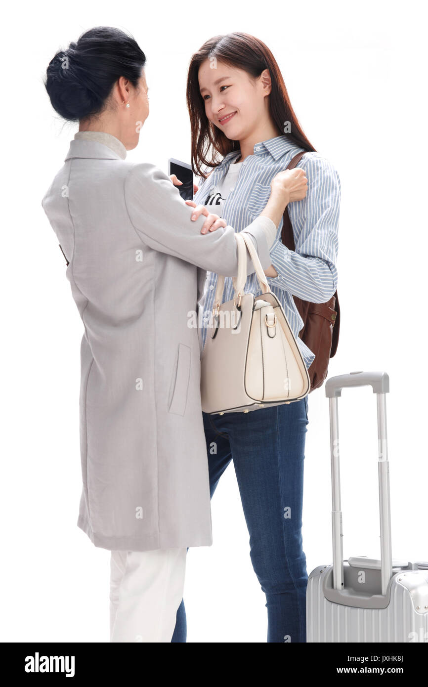 Mother and daughter goodbye Stock Photo - Alamy