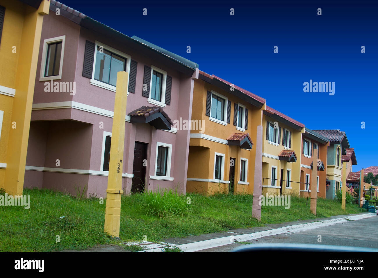Mass housing row house ready for occupancy - spring season Stock Photo ...