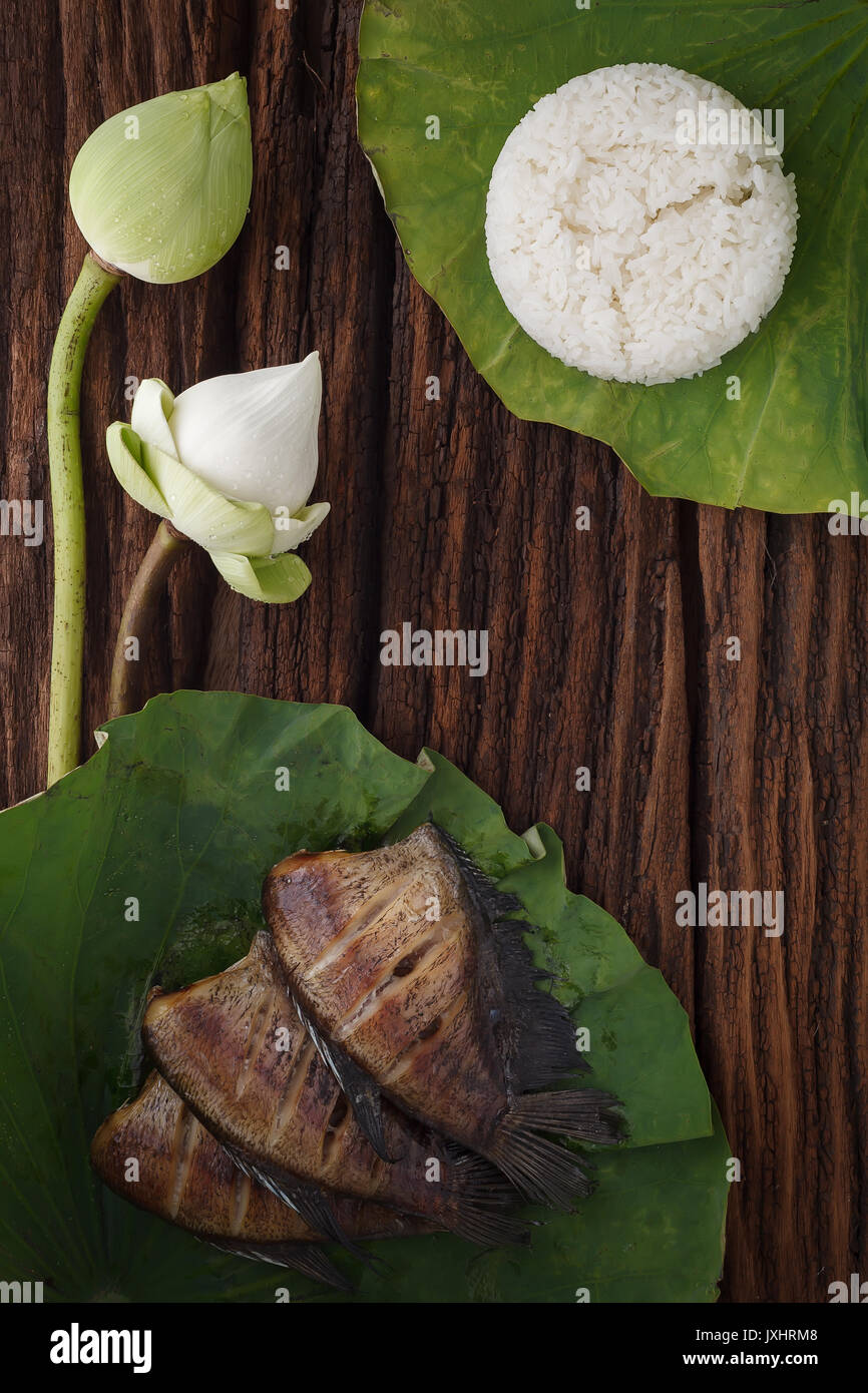thai food rice and dried salted damsel fish fried with flower lotus ...
