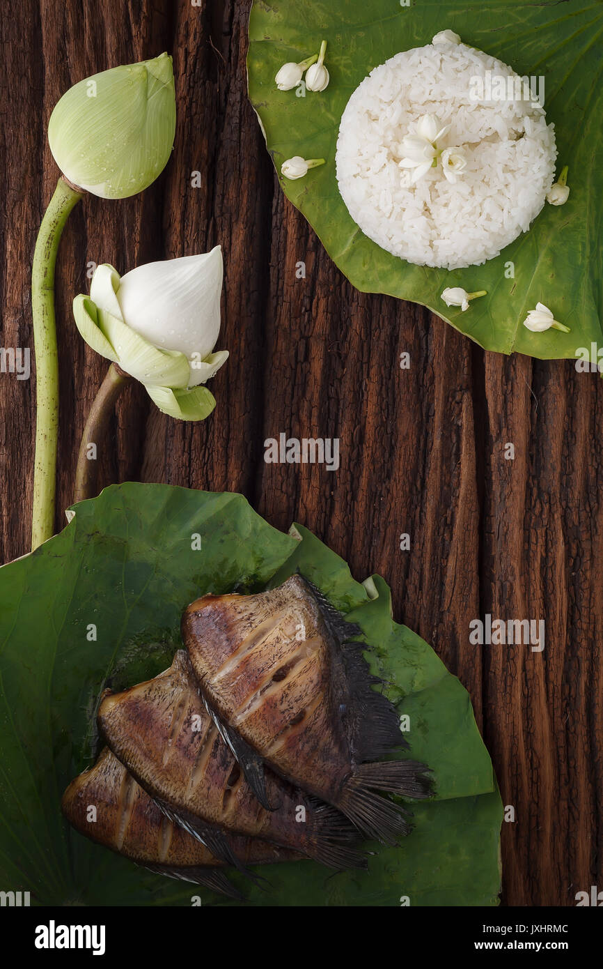 thai food rice and dried salted damsel fish fried with flower lotus ...