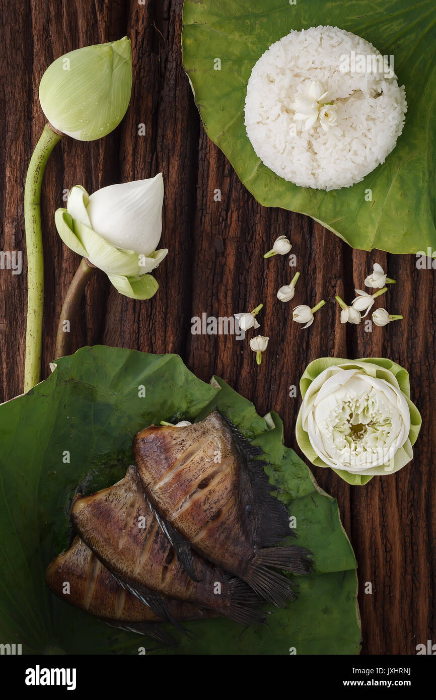 thai food rice and dried salted damsel fish fried with flower lotus ...