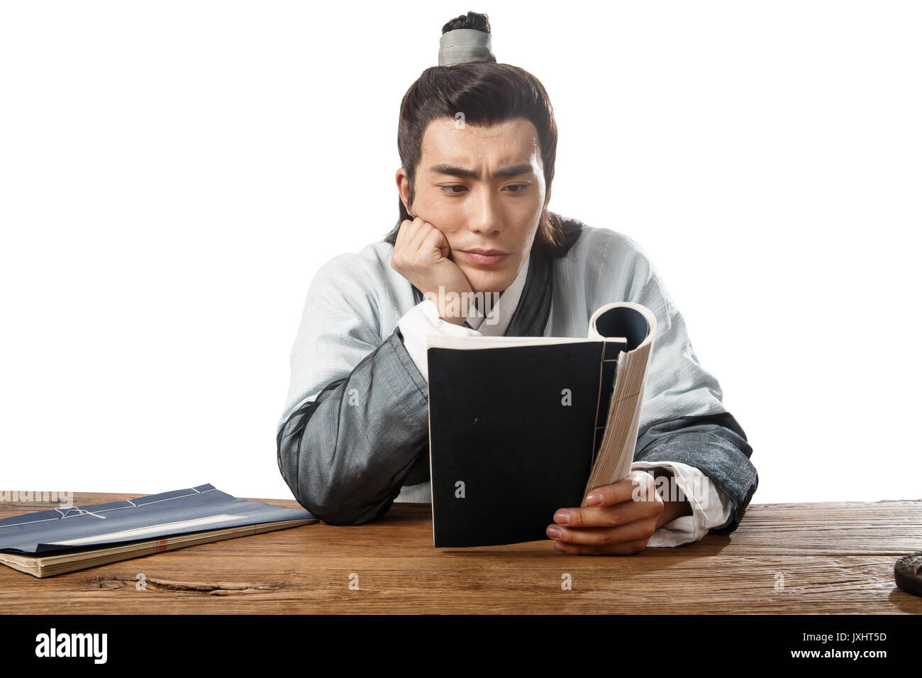A scholar dressed in ancient costume Stock Photo - Alamy