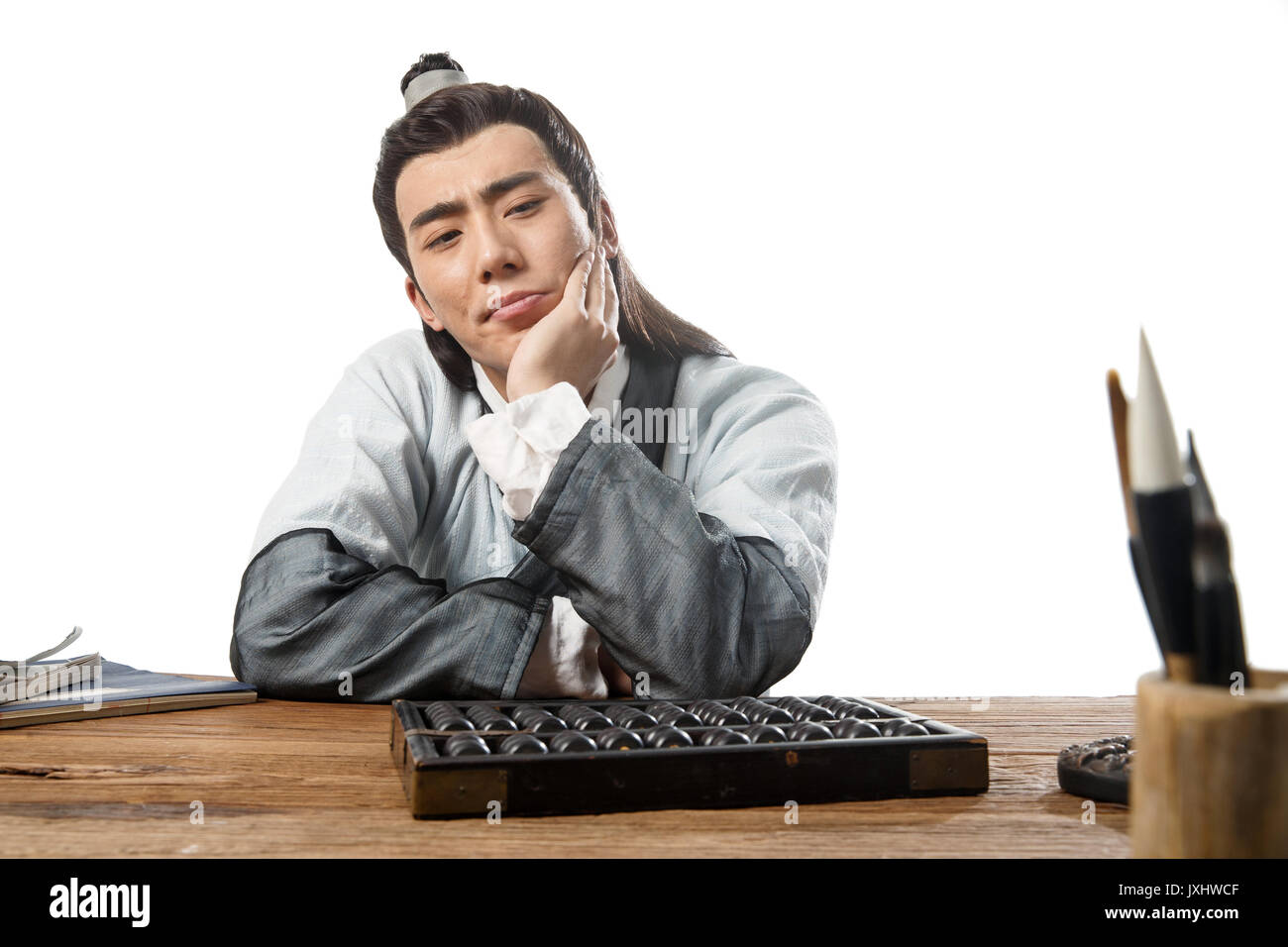 A scholar dressed in ancient costume Stock Photo - Alamy