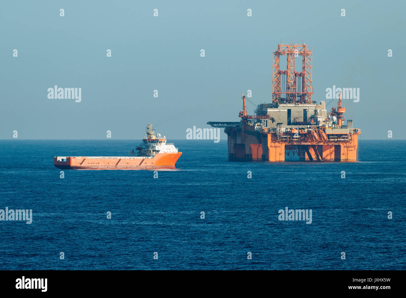 Supply vessel Normand Aurora next to West Phoenix oil rig, oil ...