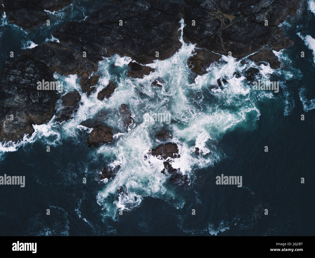 Remote ocean shore in cloudly weather and islands on coast Stock Photo ...