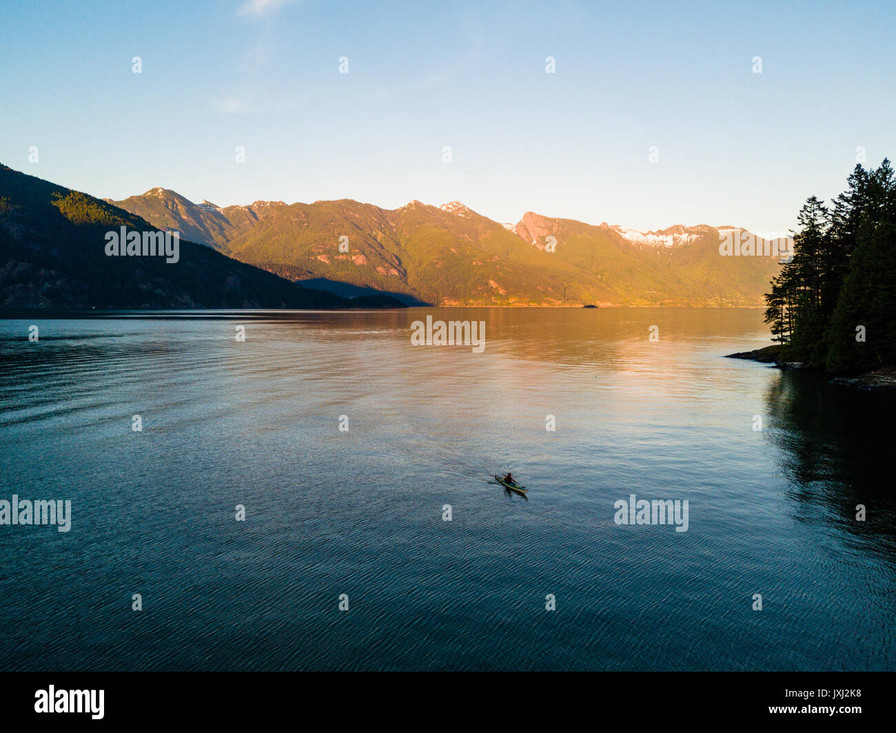 Colorful sunset in nature with reflection on water Stock Photo - Alamy