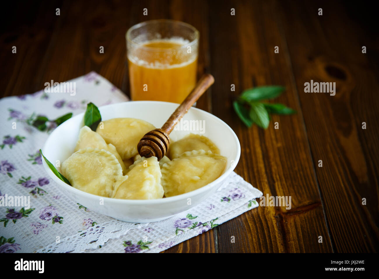 Homemade sweet ravioli with cottage cheese and honey Stock Photo - Alamy