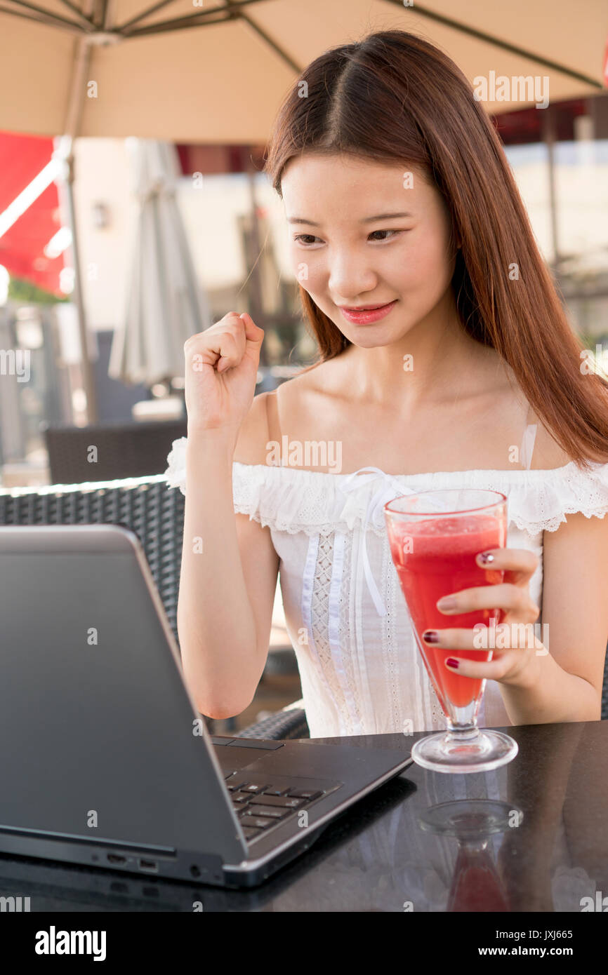 girl watching laptop Stock Photo - Alamy