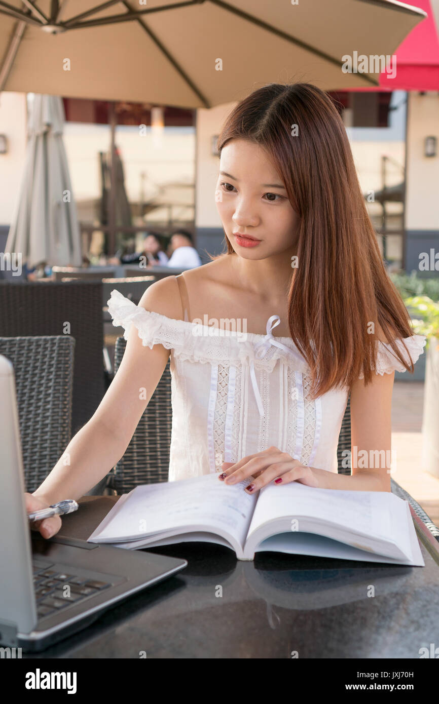 asian girl is studying Stock Photo - Alamy