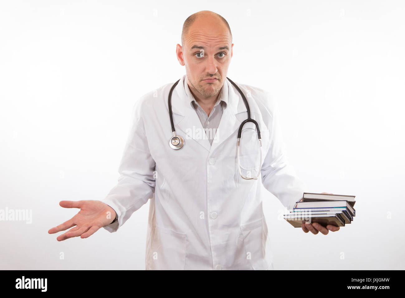 Confused doctor shrugging hi-res stock photography and images - Alamy