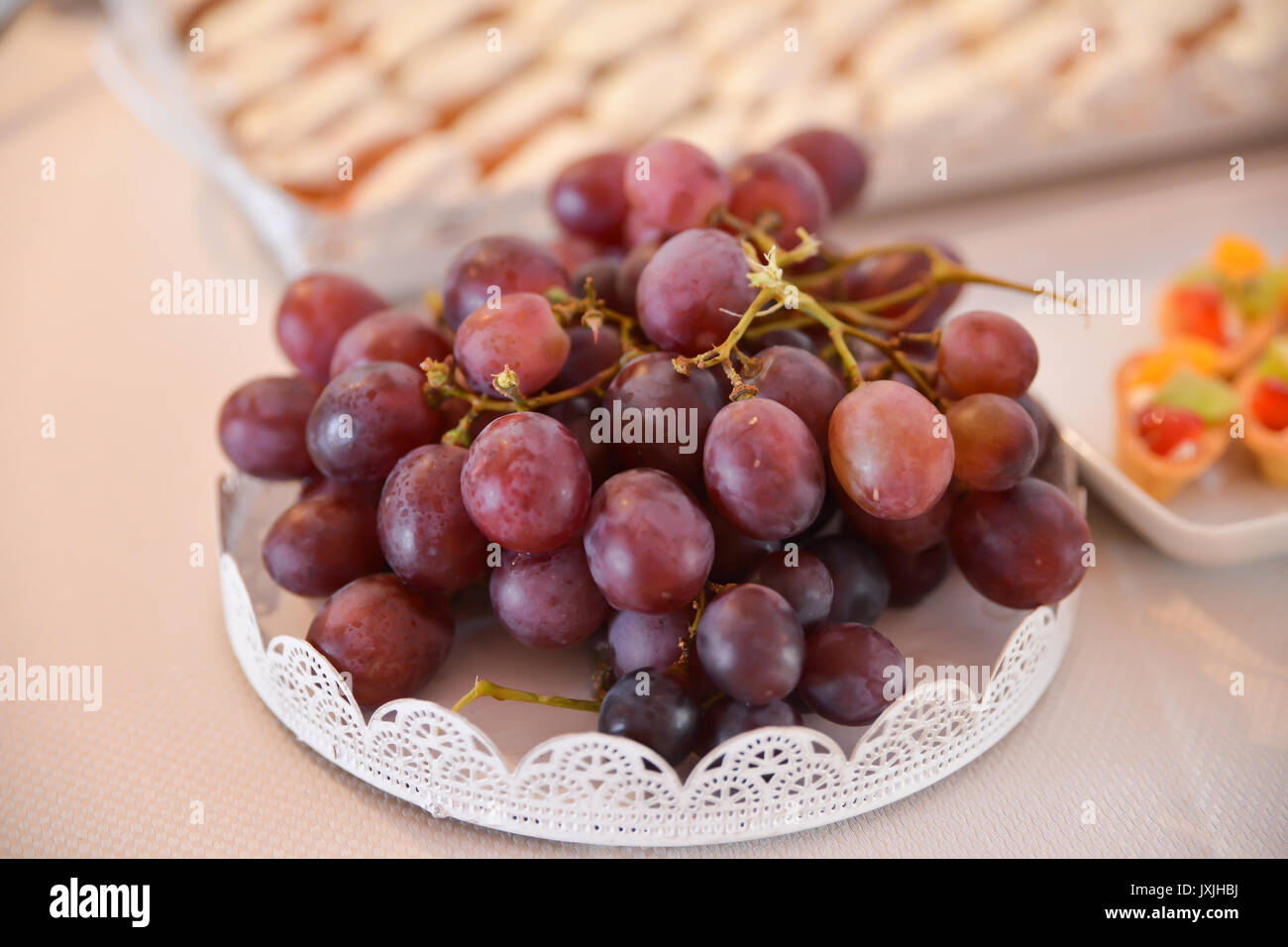 delicious fruits arranged on the table for wedding reception Stock ...