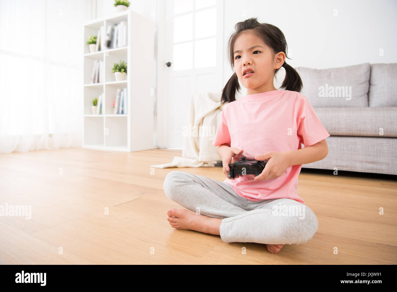 sweet little girl kid children showing sad unhappy expression sitting ...