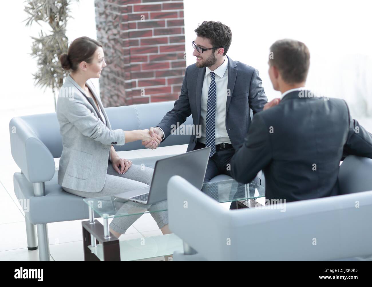 business handshake women with the client Stock Photo - Alamy