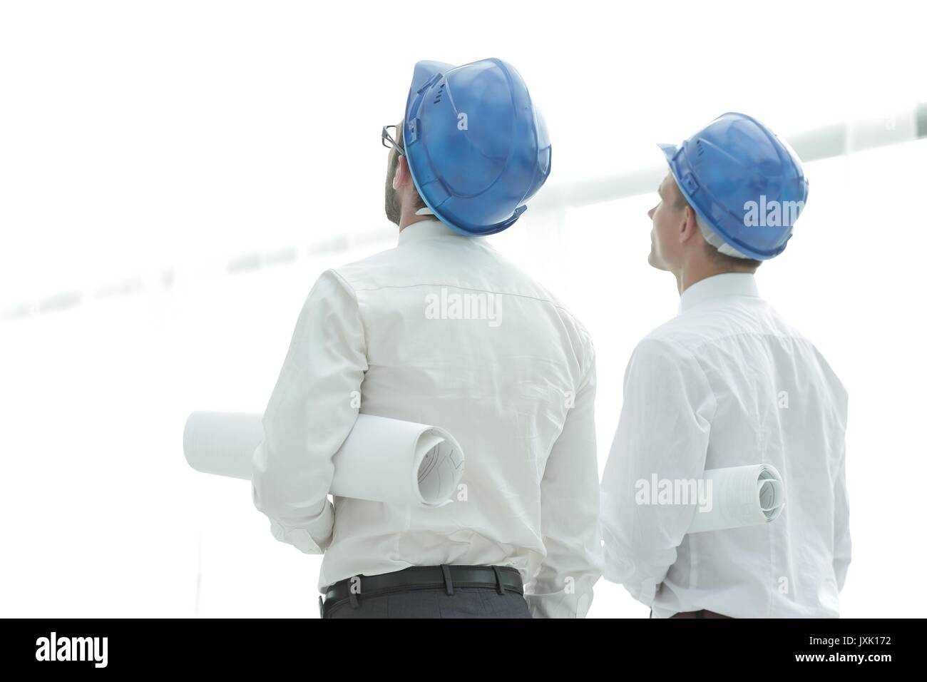 rear view. architect and Builder Stock Photo - Alamy