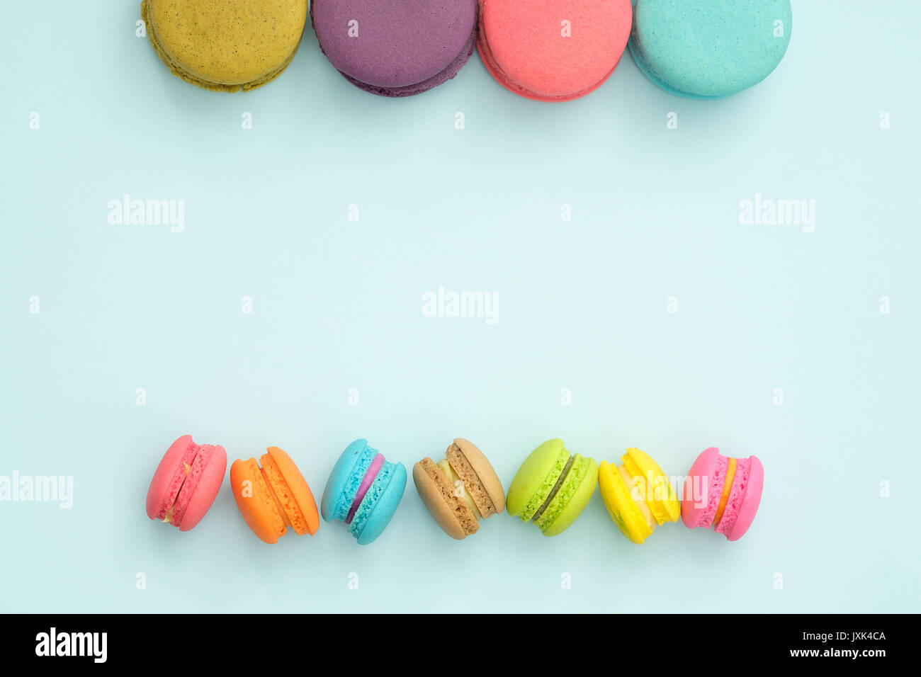colorful macaroons on the turquoise background, Sweet and tasty for ...