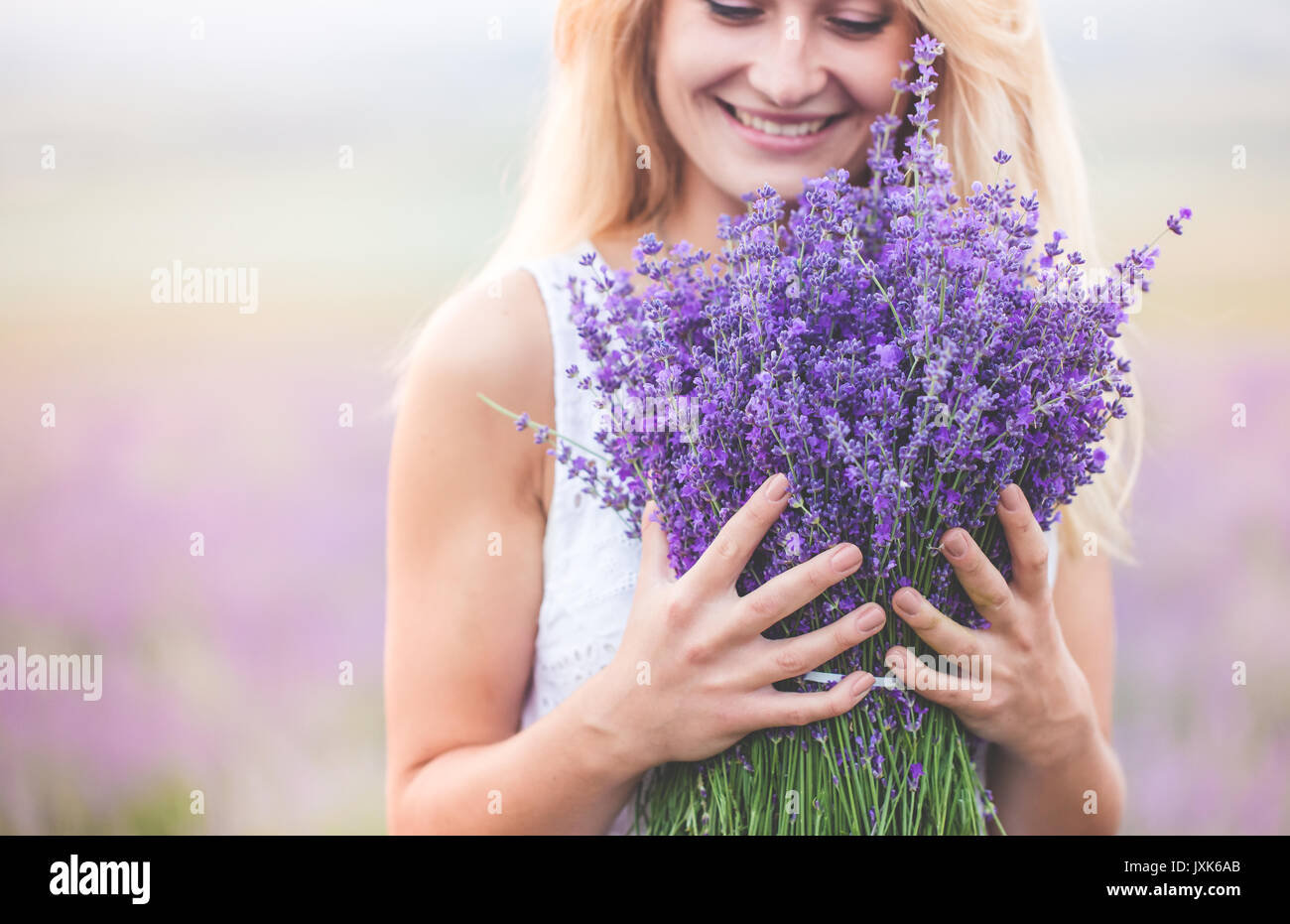Beautiful girl on the lavender field Stock Photo - Alamy