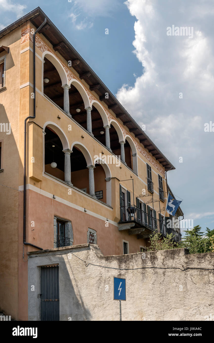 ancient loggias on facade of building on little island at Orta lake ...