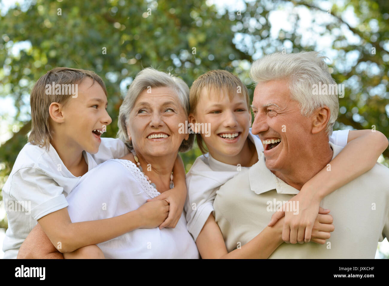 Grandparents with grandsons having fun Stock Photo - Alamy