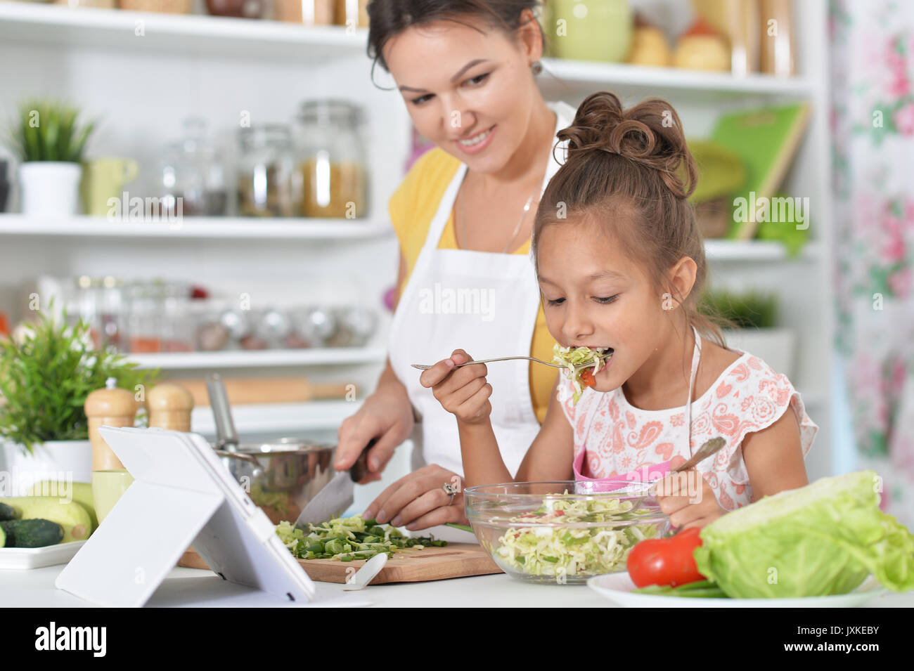 Female mother cooking hi-res stock photography and images - Alamy