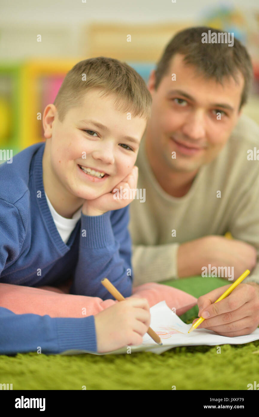 father and son doing homework Stock Photo - Alamy