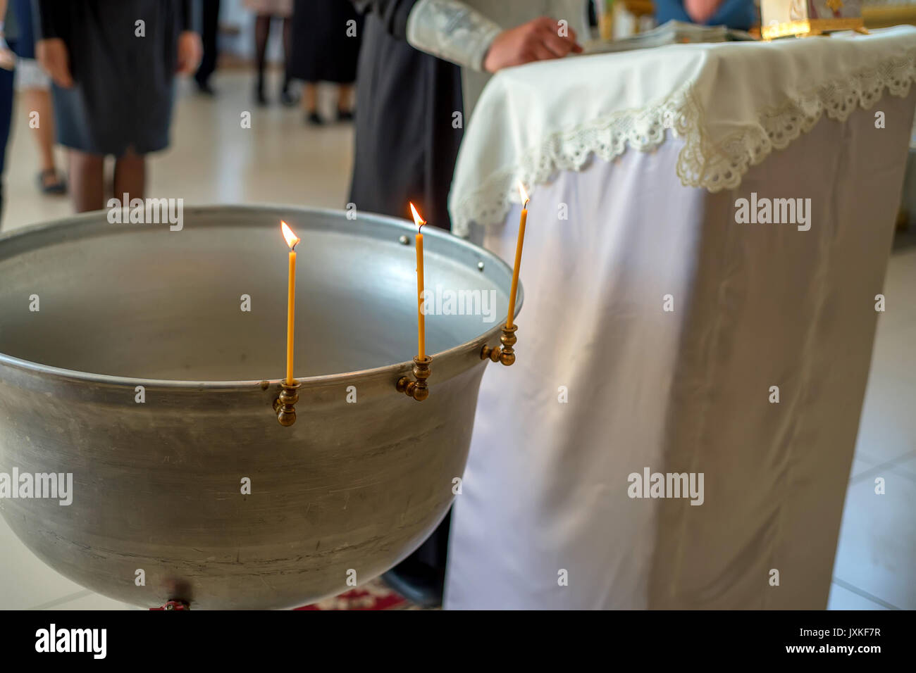 Orthodox priest baptizing hi-res stock photography and images - Alamy
