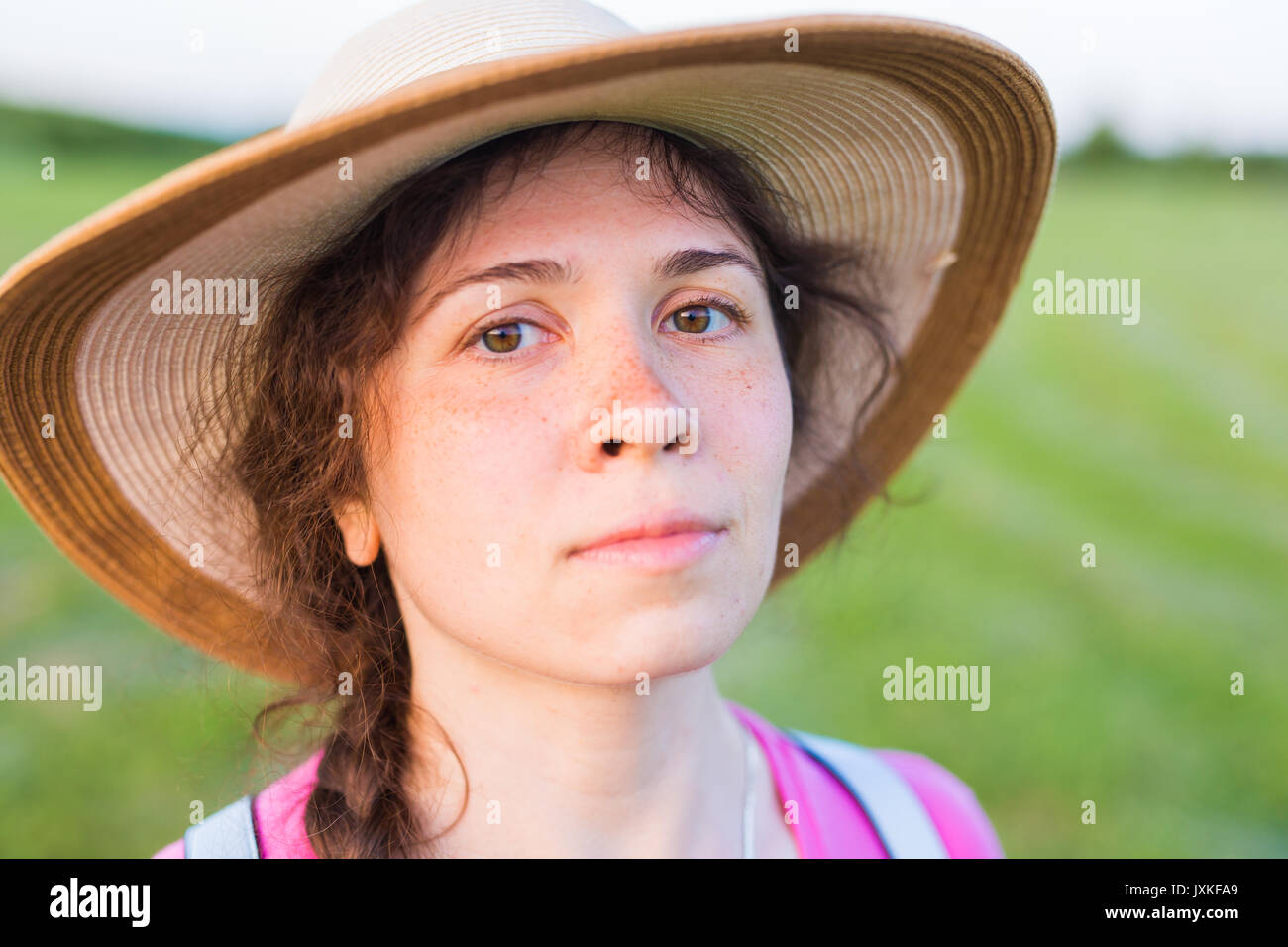 Close up portrait woman with freckles in summer nature Stock Photo - Alamy