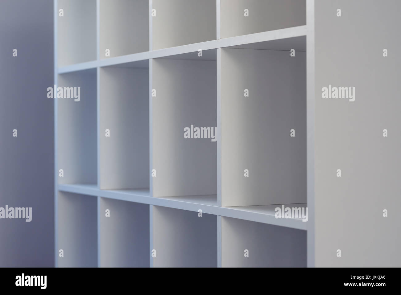 Empty office or bookcase library shelves with blank copy space for ...