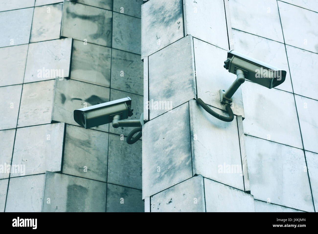 Big brother concept with two security cameras on the wall Stock Photo ...