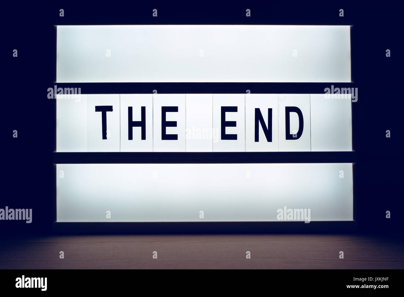 Blinking lightbox signage with The End text Stock Photo - Alamy
