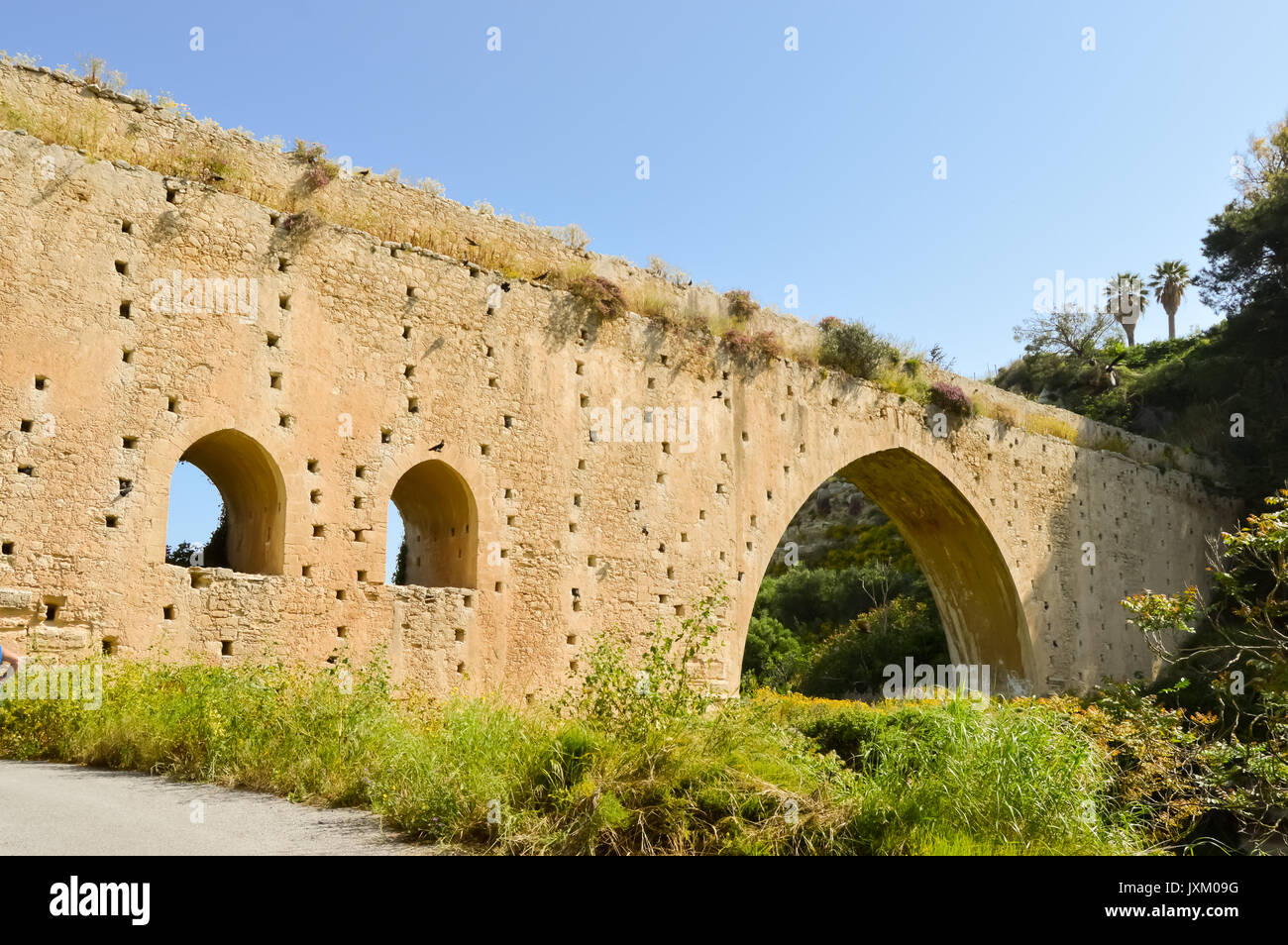 Old stone bridge with arches in the mountains of central Crete Stock ...
