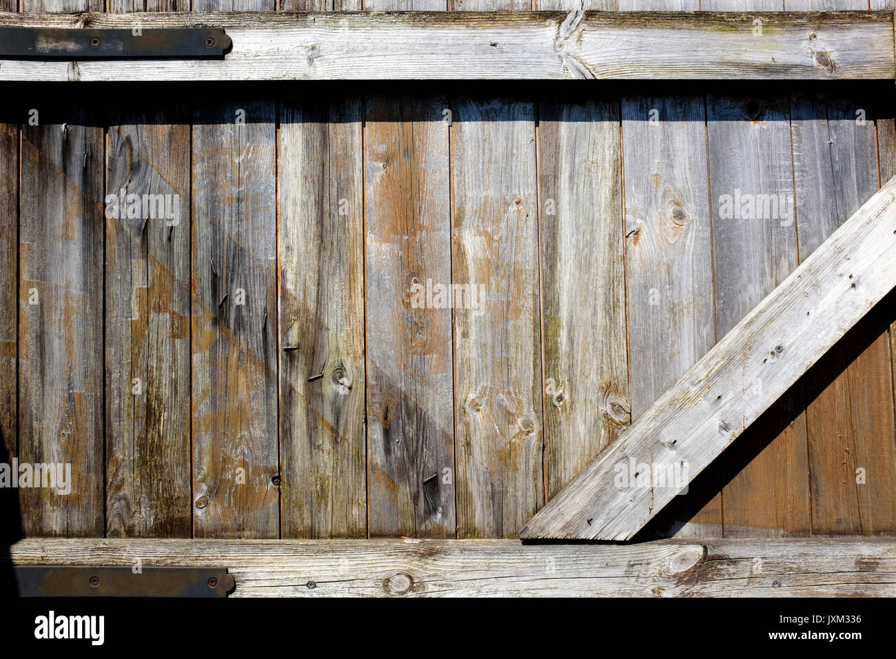 Detail shot of a homemade wooden gate, with planks and hinges Stock ...