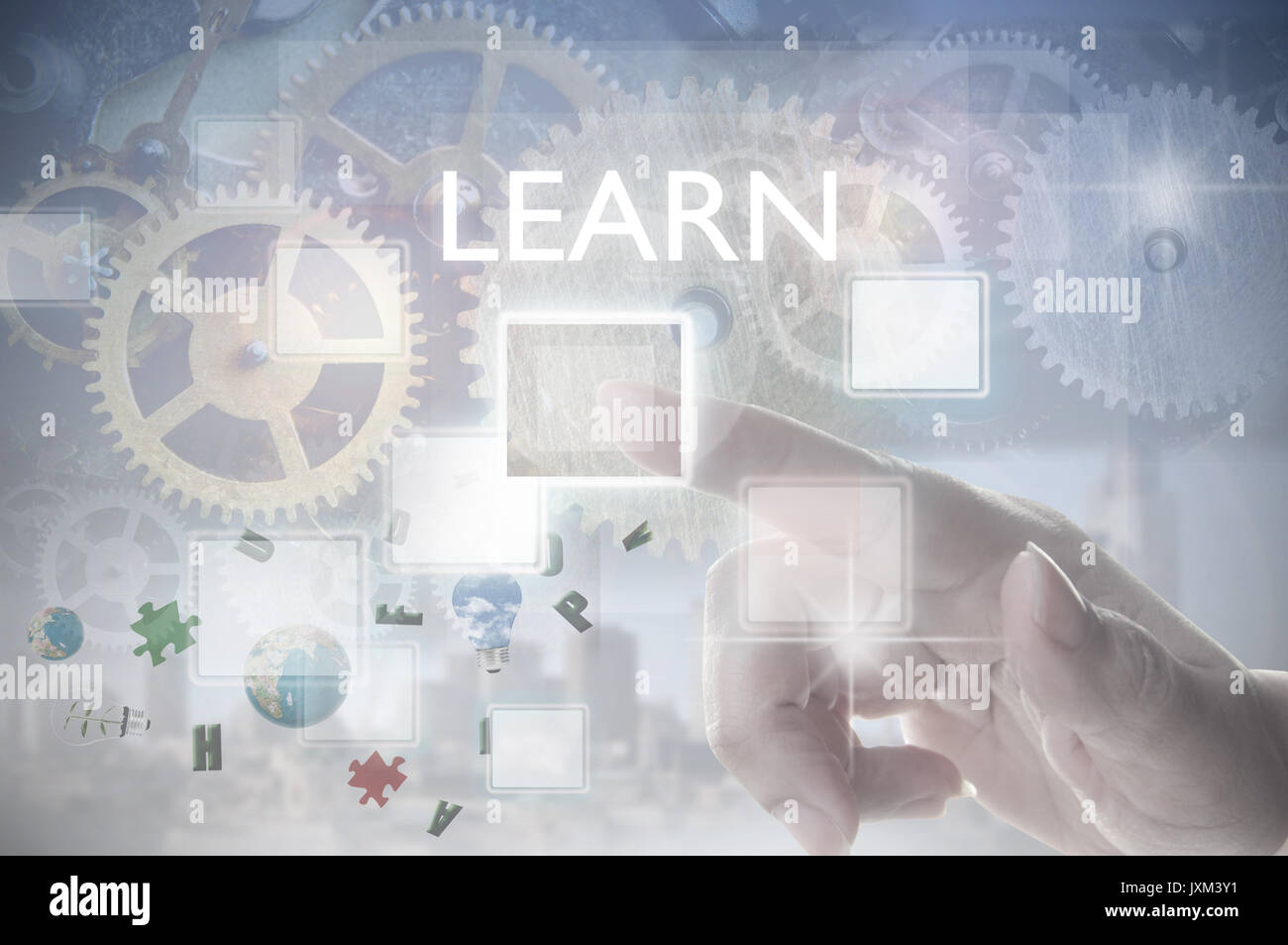 Finger clicking on learn touchscreen Stock Photo - Alamy