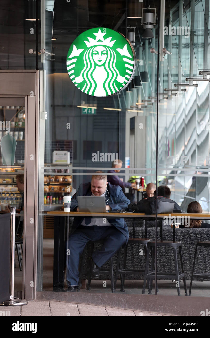 Starbucks and laptop hi-res stock photography and images - Alamy