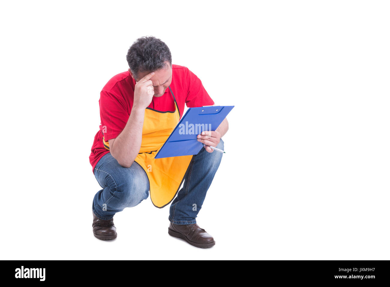 Tired male seller doing inventory in the supermarket isolated on white ...