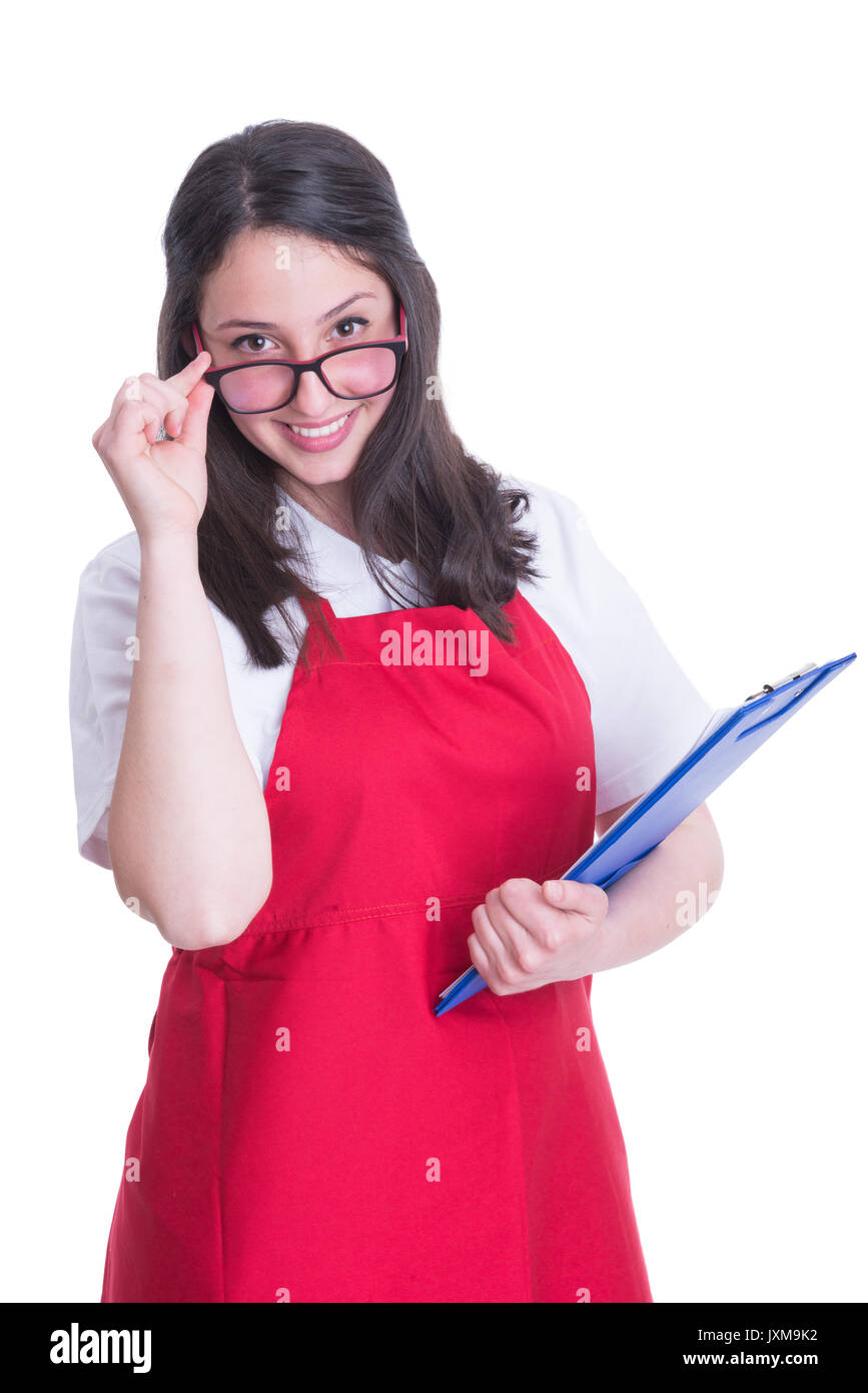 Confident pretty employee with eyeglasses checking the products ...