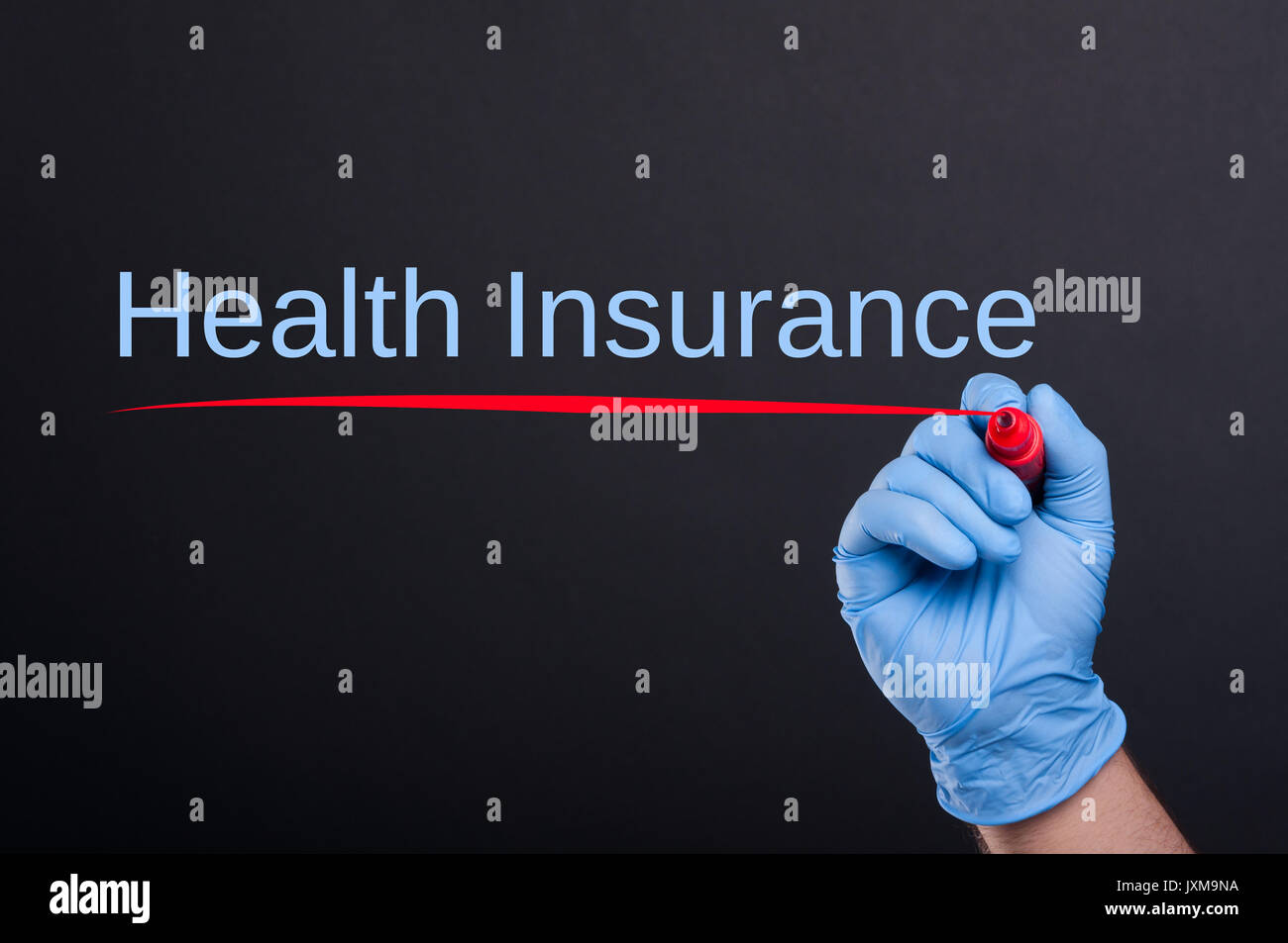 Health insurance text written by doctor hand on transparent glass as ...