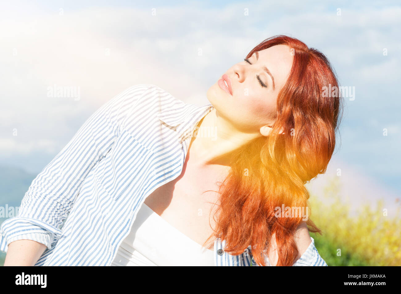Woman relaxing in the sun hi-res stock photography and images - Alamy