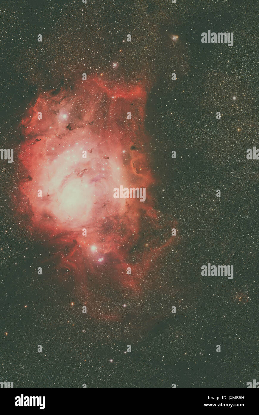 Lagoon Nebula. This giant cloud of gas and dust is creating intensely ...