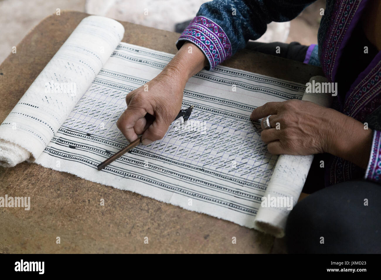 Chiang Mai, Thailand - January 11, 2017: Hill tribe working on pattern ...