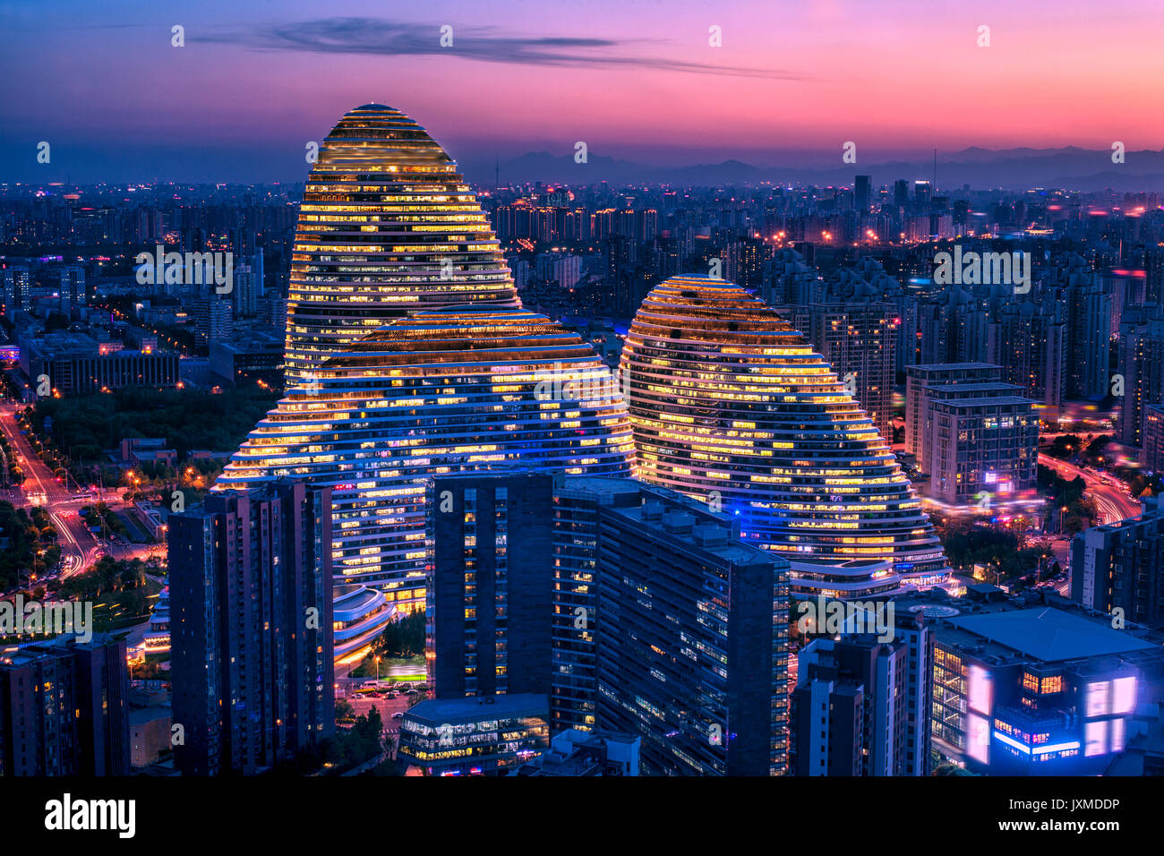 Night view of SOHO architecture in Wangjing,Beijing Stock Photo - Alamy