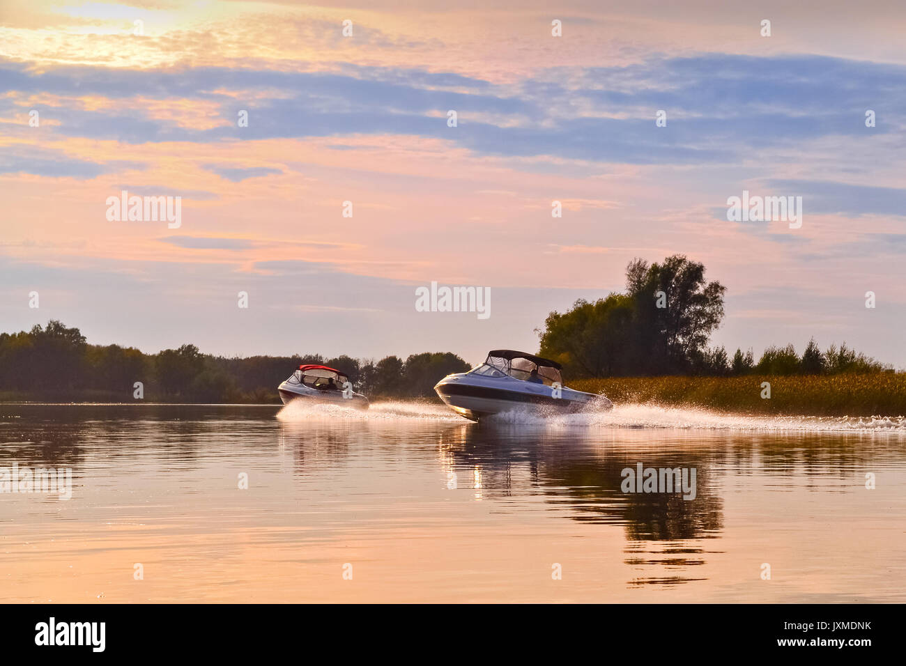 Autumn river landscape with a boat Stock Photo - Alamy