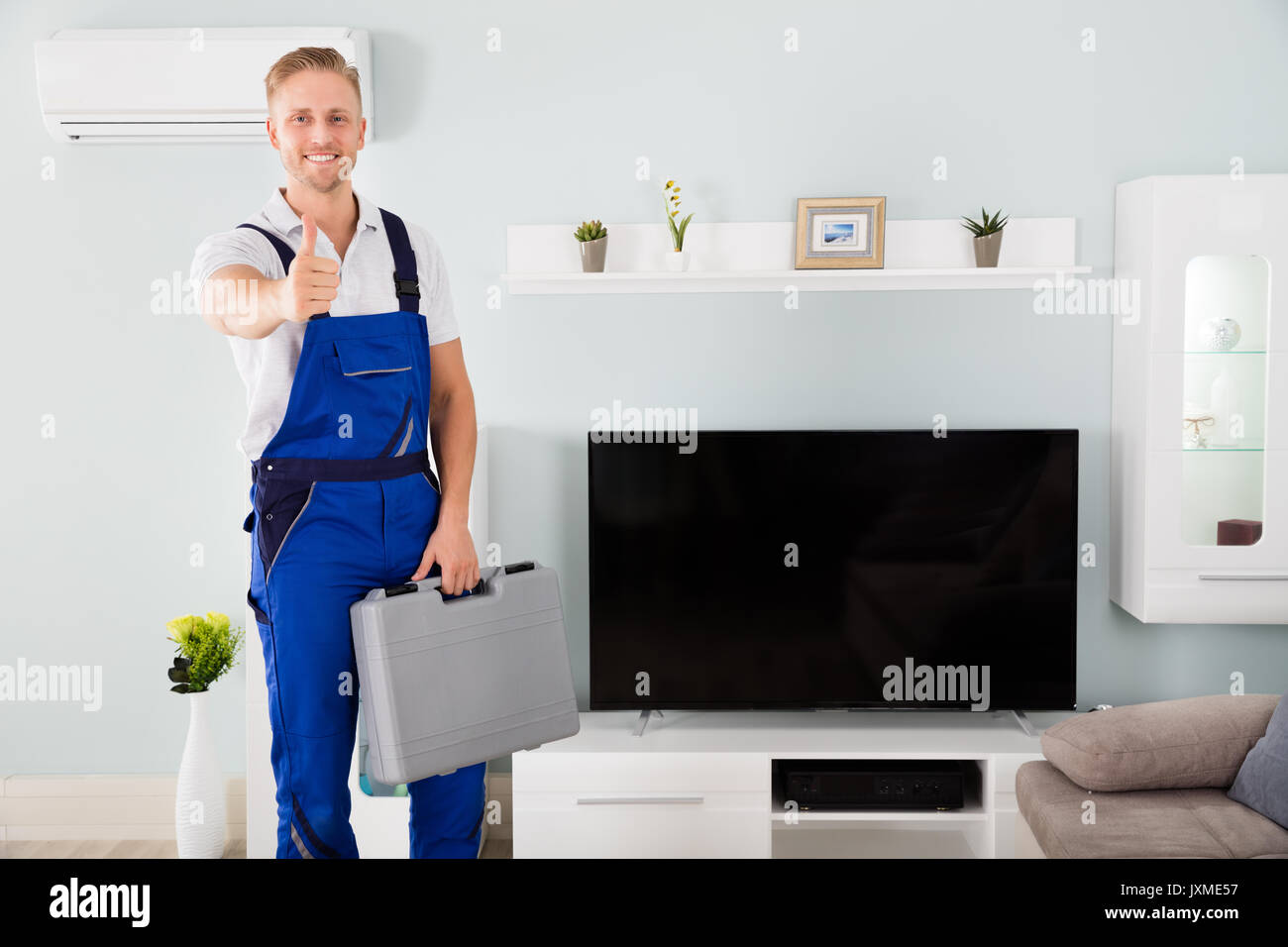 Technician repair hi-res stock photography and images - Alamy