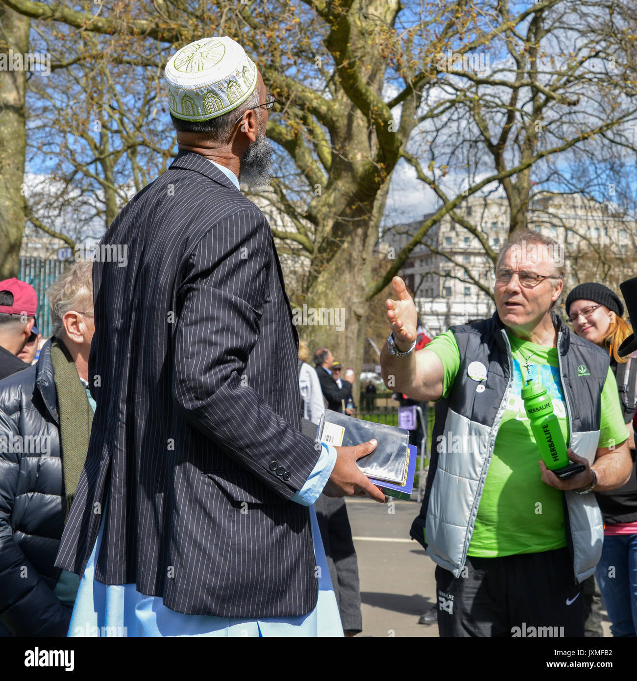 Muslim fundamentalist preacher holding a Koran. Speakers Corner, Hyde ...
