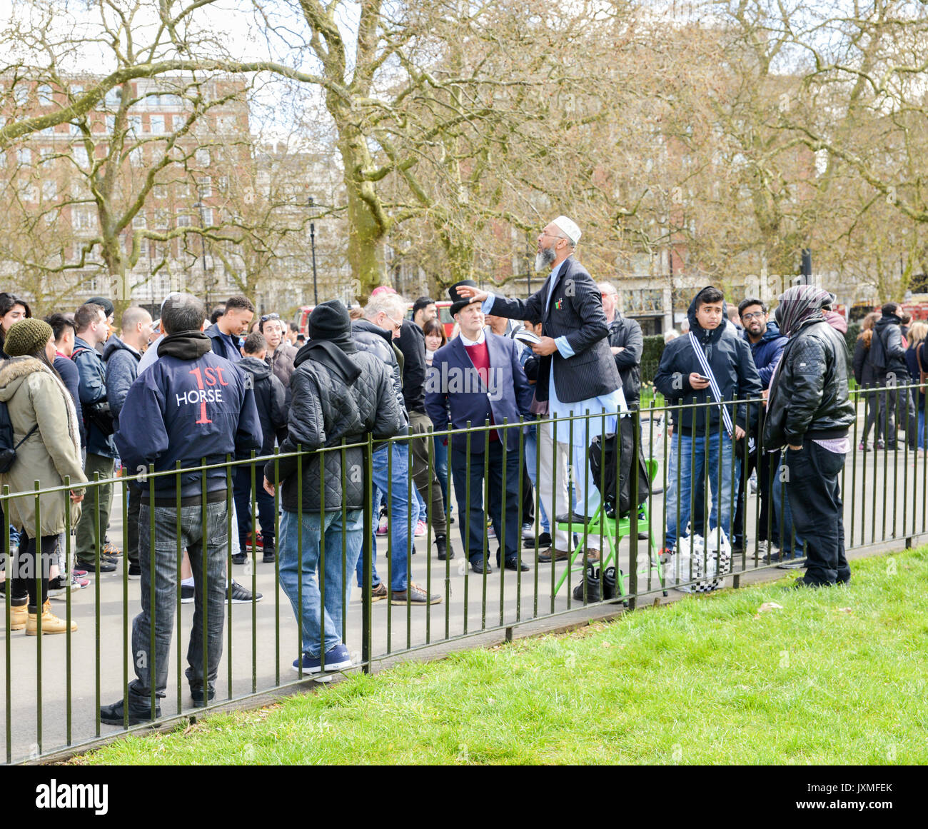 Muslim fundamentalist preacher holding a Koran. Speakers Corner, Hyde ...