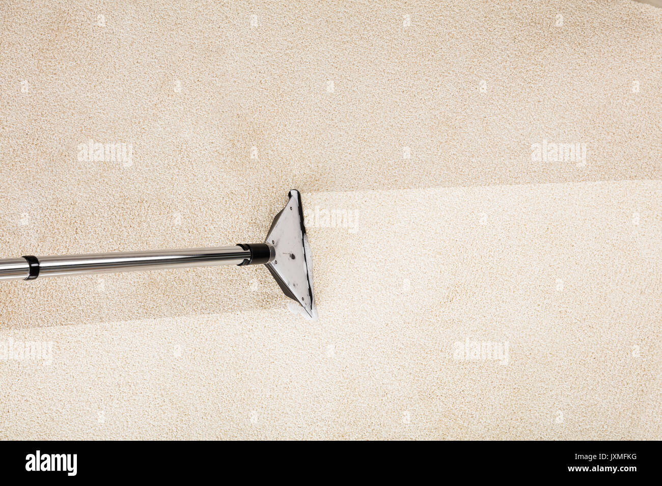 Close-up Photo Of Vacuum Cleaner With Carpet Stock Photo - Alamy
