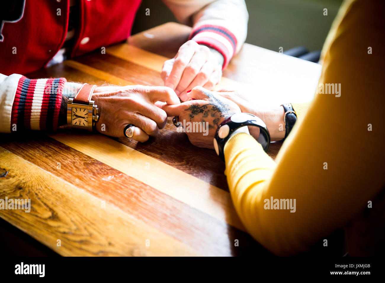 Hands on table hi-res stock photography and images - Alamy